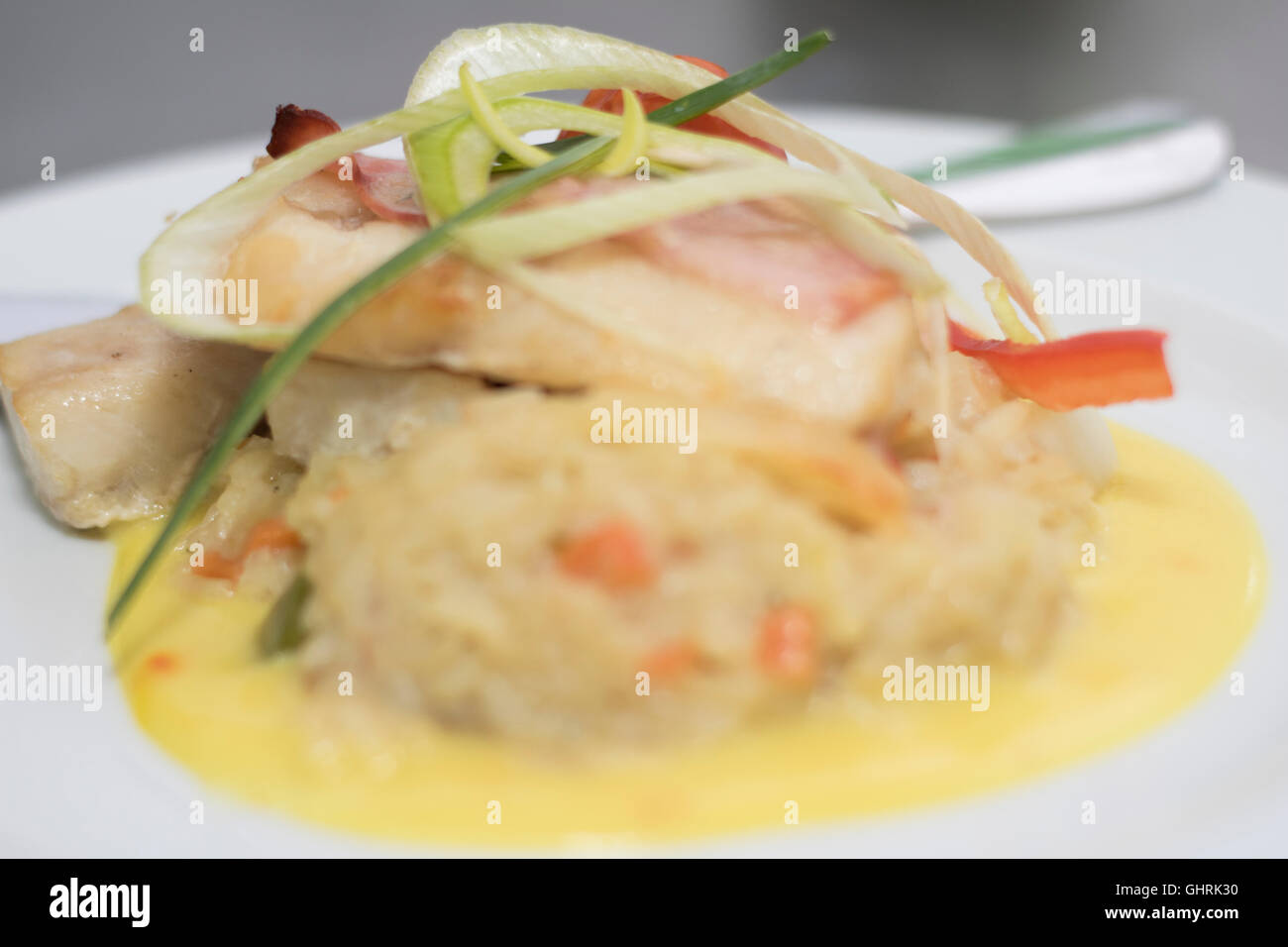 Zander with risotto and rice Stock Photo - Alamy