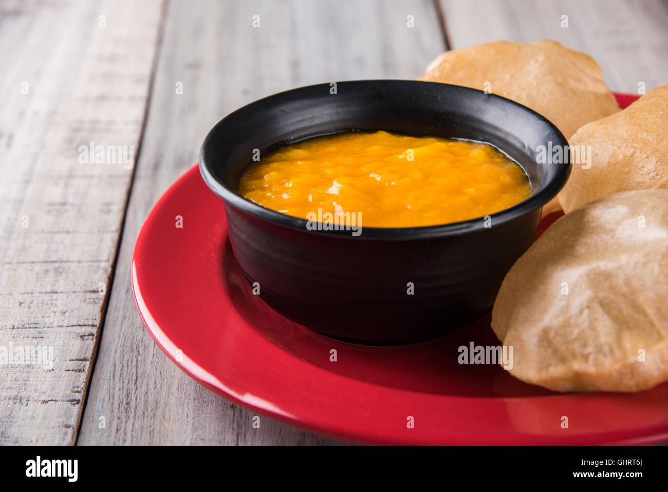 Aamras or Aam Ras Puri: Puri which is an indian fried small bread and ...