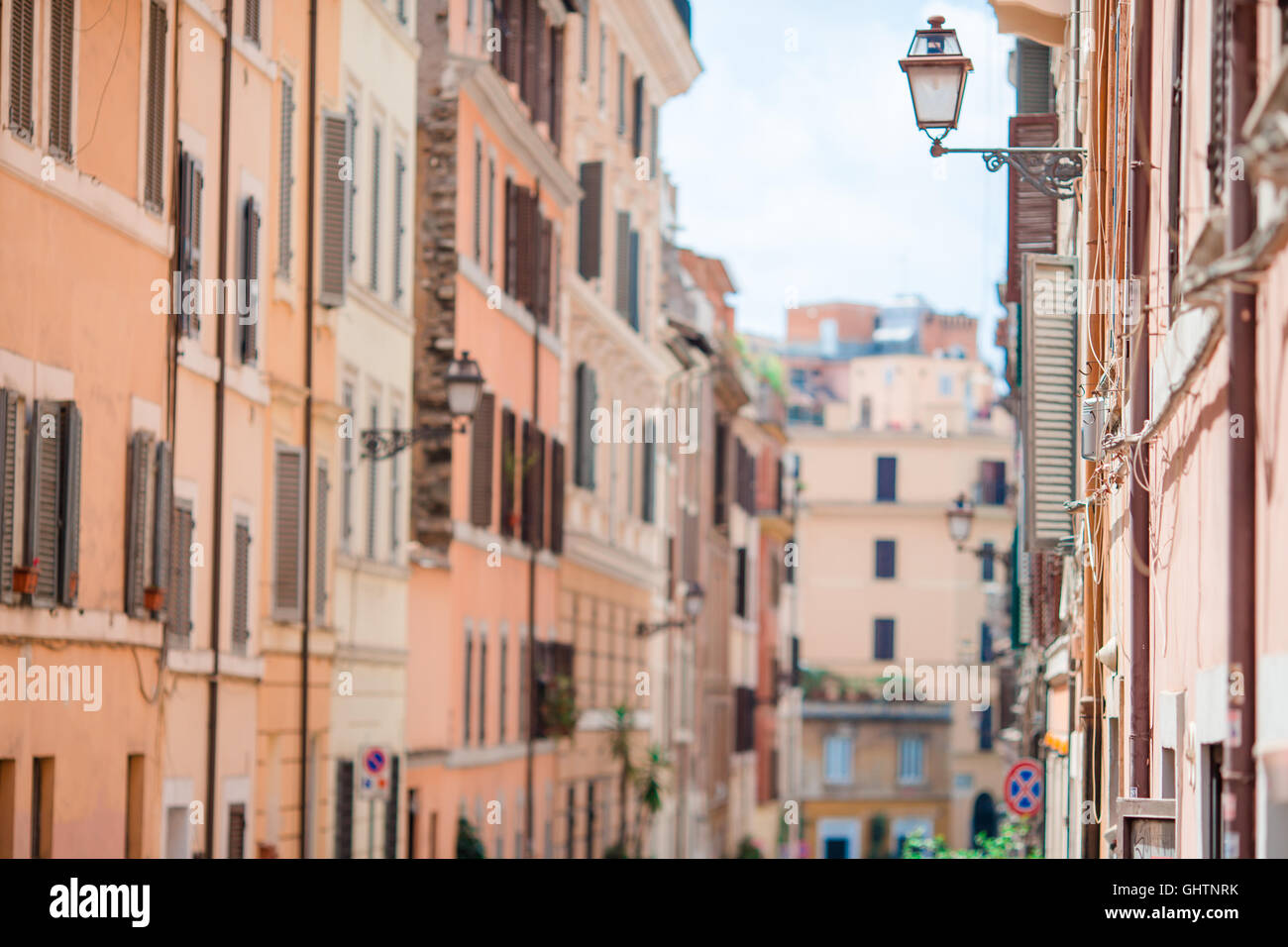 Old beautiful empty streets in Rome, Italy. Close-up of a street light ...