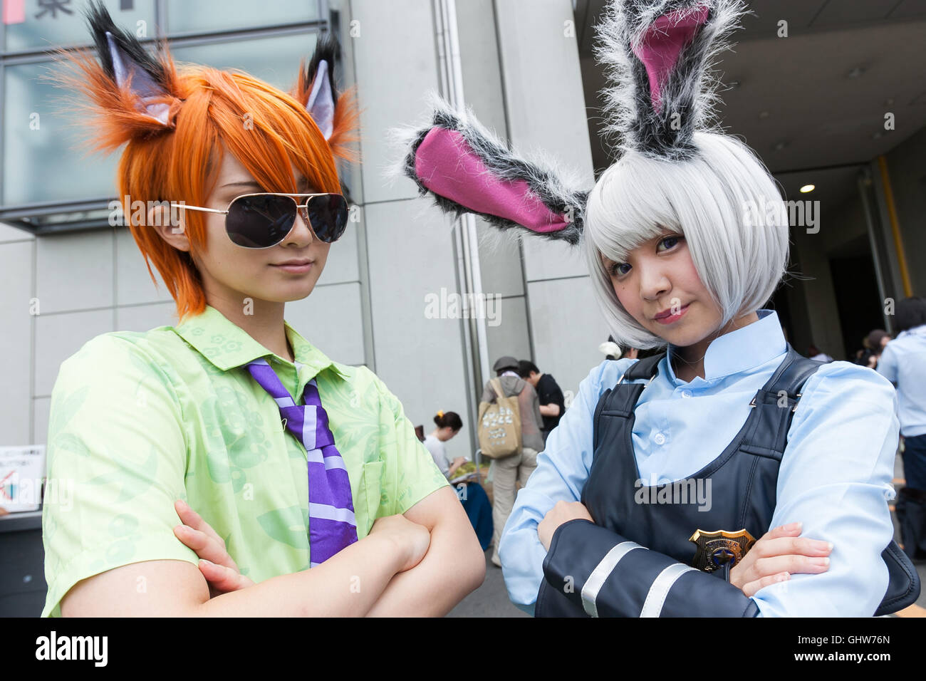 Tokyo, Japan. 12th August, 2016. Cosplayers pose for a photograph ...