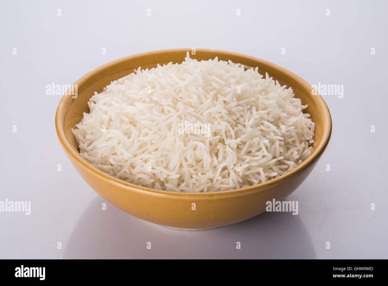 basmati rice in a brass bowl, cooked basmati rice, cooked plain rice ...