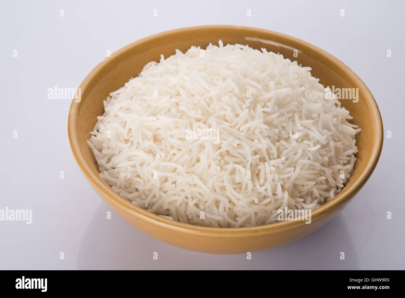 basmati rice in a brass bowl, cooked basmati rice, cooked plain rice ...