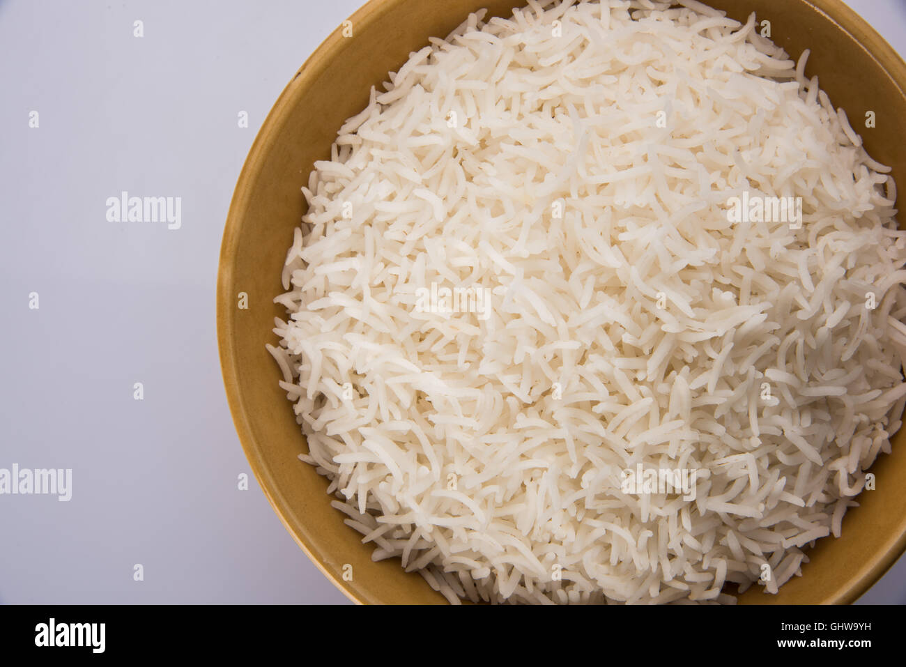 basmati rice in a brass bowl, cooked basmati rice, cooked plain rice ...