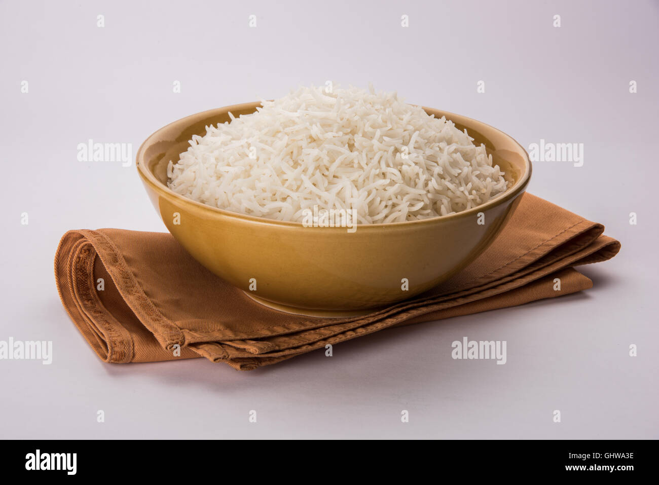 basmati rice in a brass bowl, cooked basmati rice, cooked plain rice ...