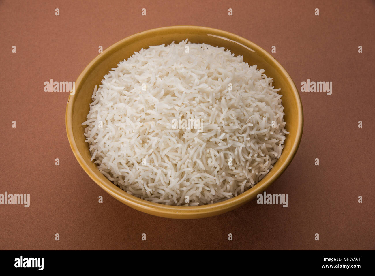 basmati rice in a brass bowl, cooked basmati rice, cooked plain rice ...