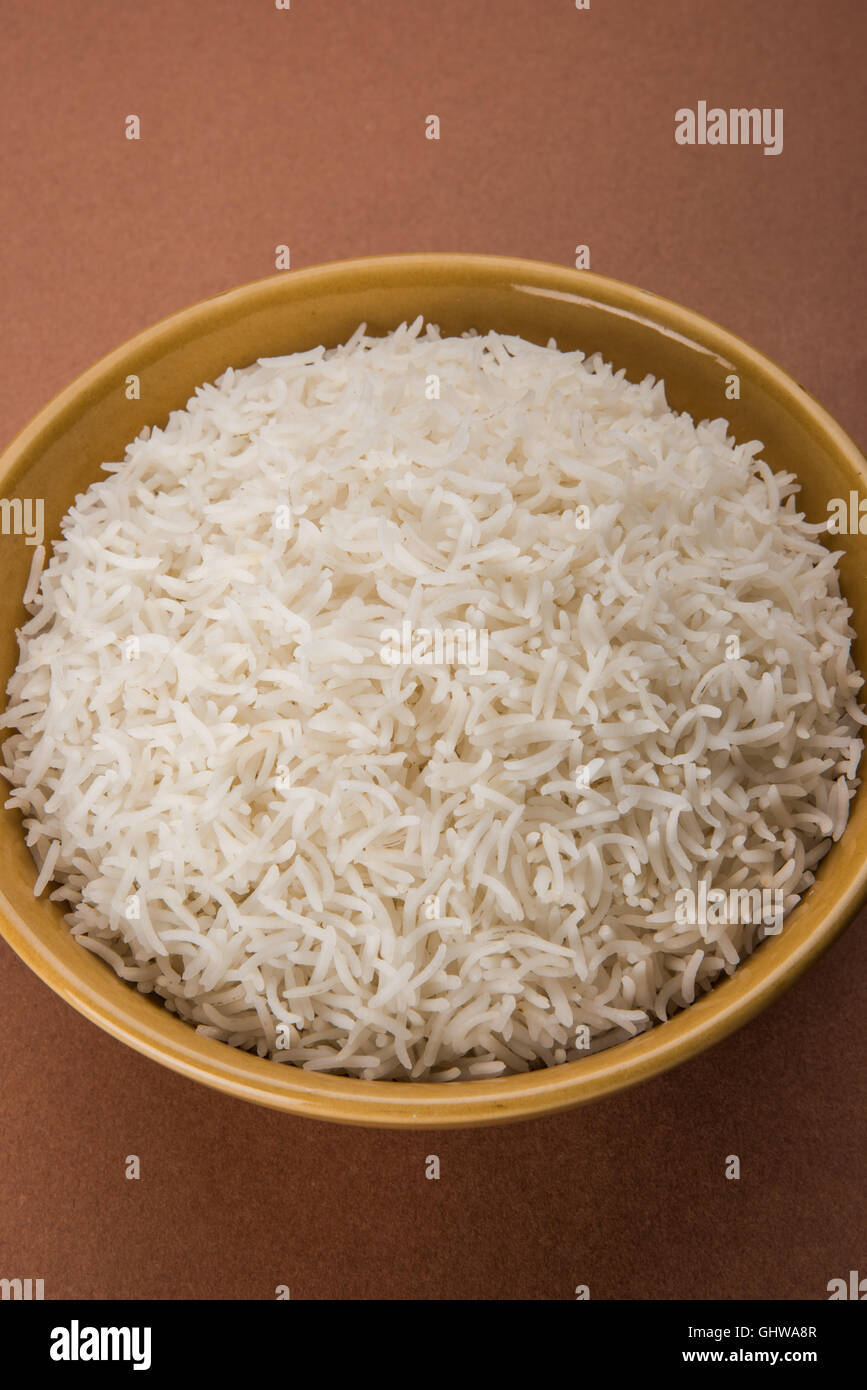 basmati rice in a brass bowl, cooked basmati rice, cooked plain rice ...