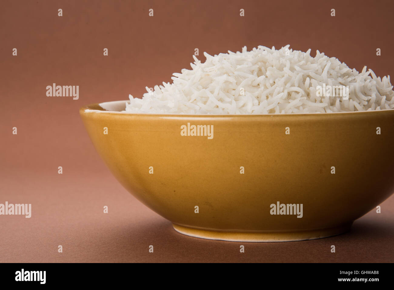 basmati rice in a brass bowl, cooked basmati rice, cooked plain rice ...