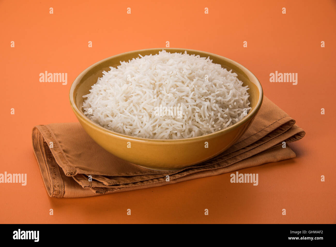 basmati rice in a brass bowl, cooked basmati rice, cooked plain rice ...