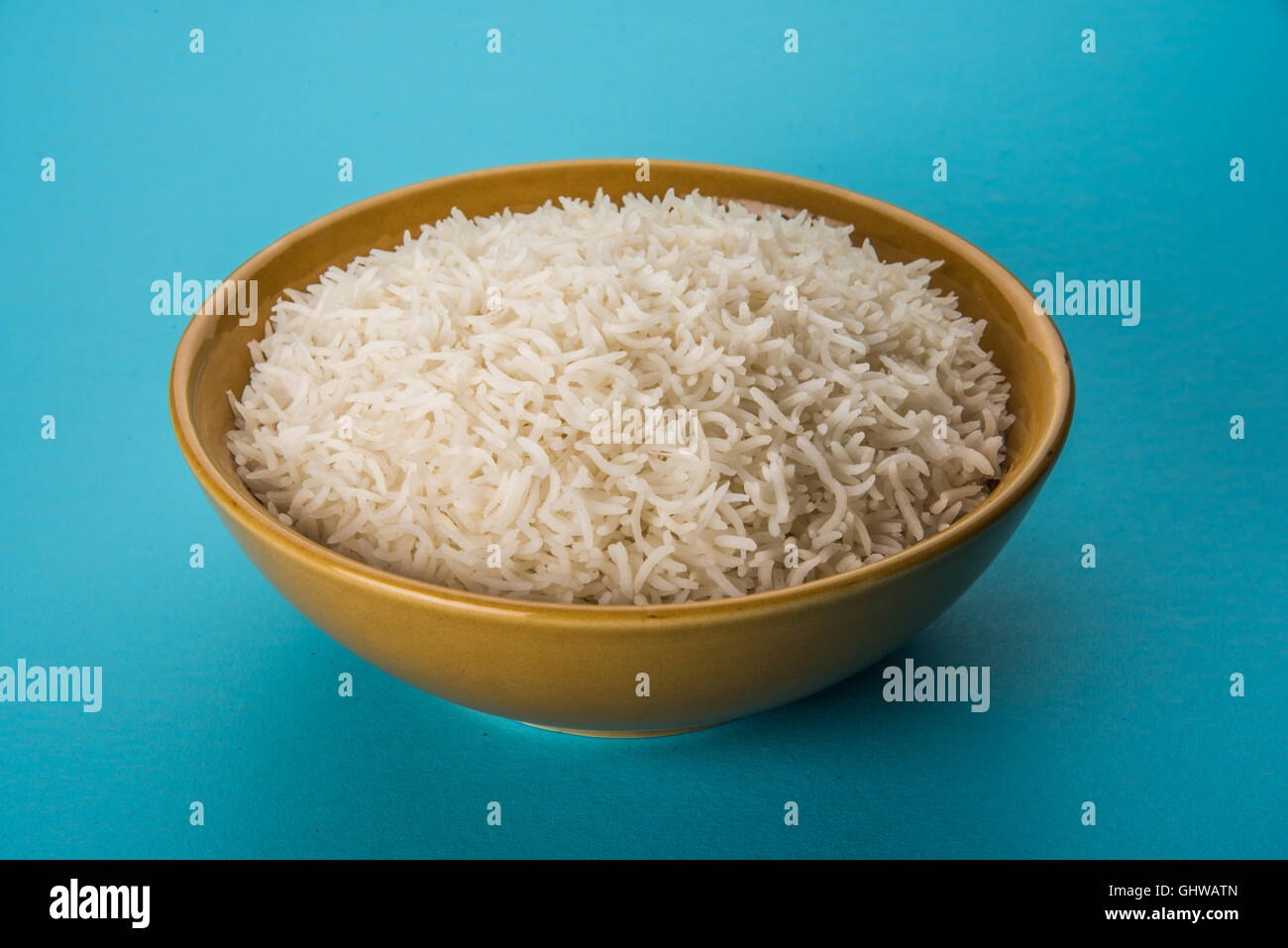 basmati rice in a brass bowl, cooked basmati rice, cooked plain rice ...