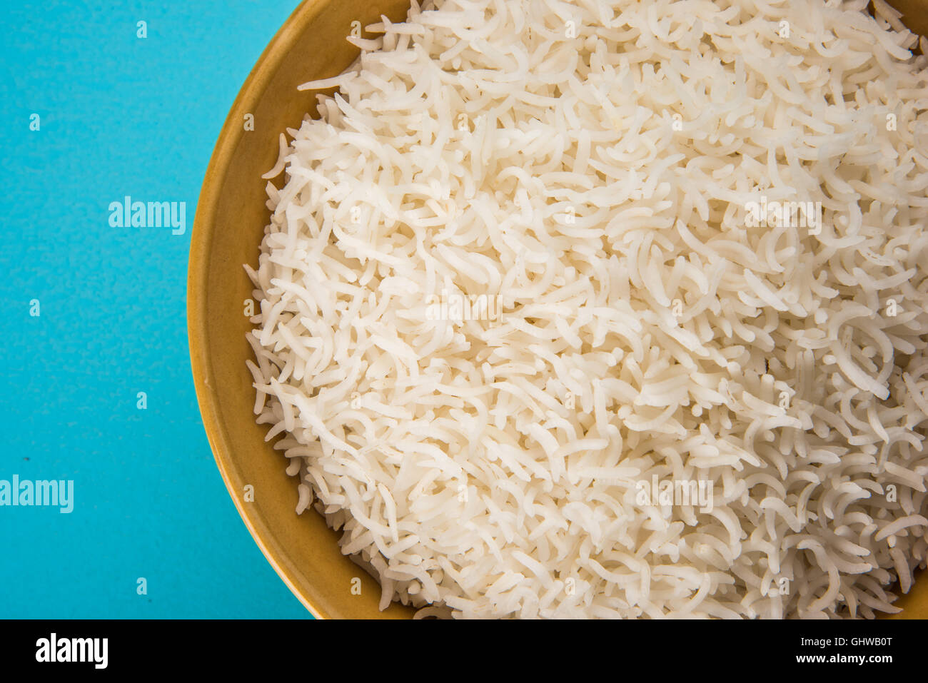 basmati rice in a brass bowl, cooked basmati rice, cooked plain rice ...