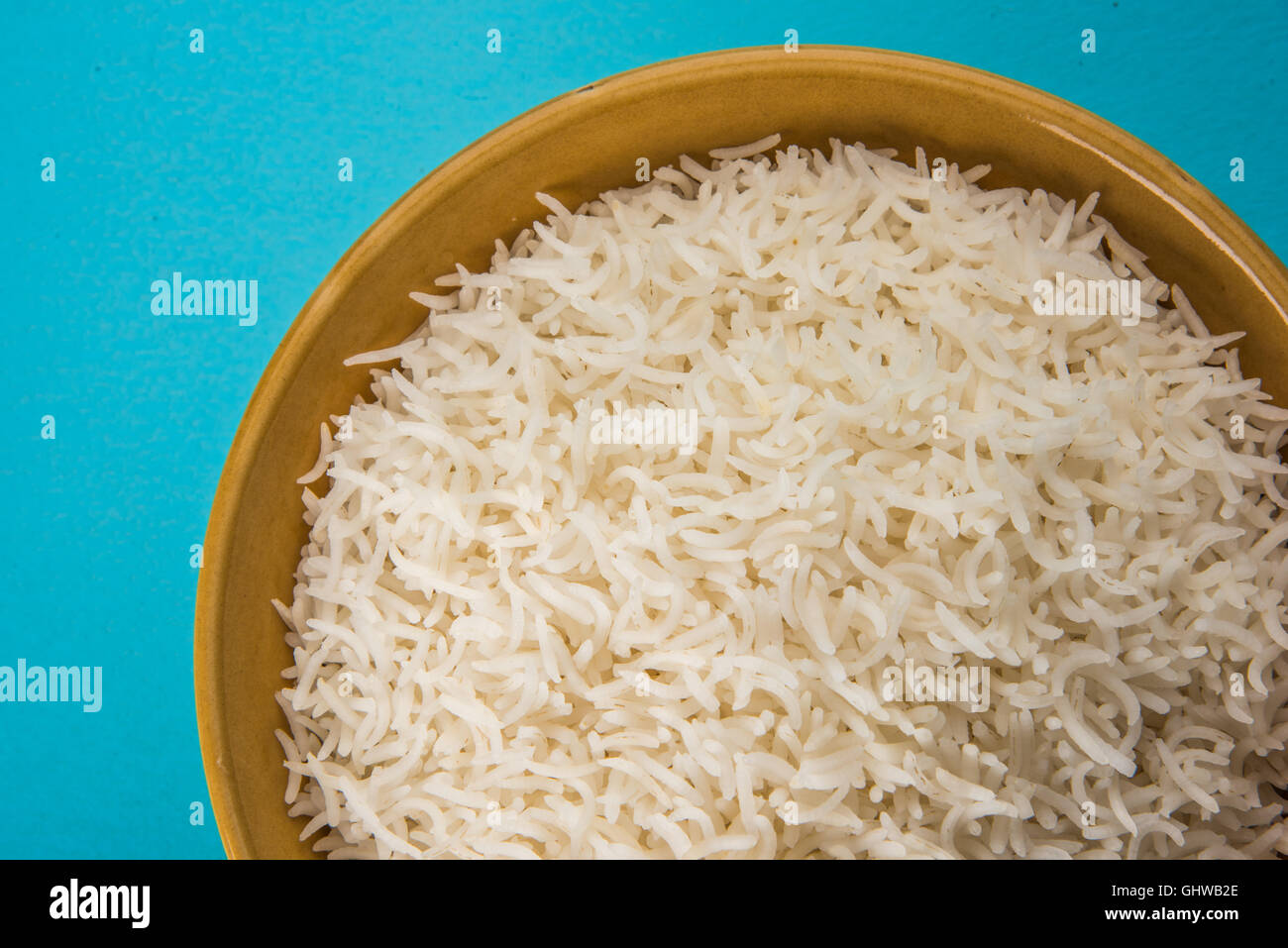 basmati rice in a brass bowl, cooked basmati rice, cooked plain rice ...