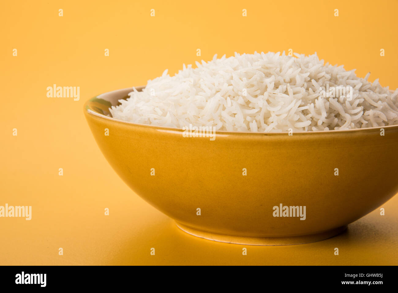 basmati rice in a brass bowl, cooked basmati rice, cooked plain rice ...