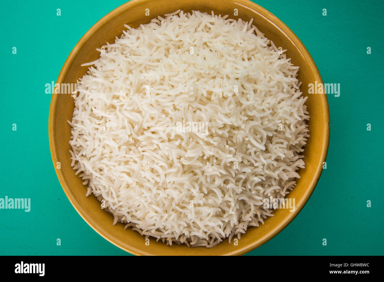 basmati rice in a brass bowl, cooked basmati rice, cooked plain rice ...