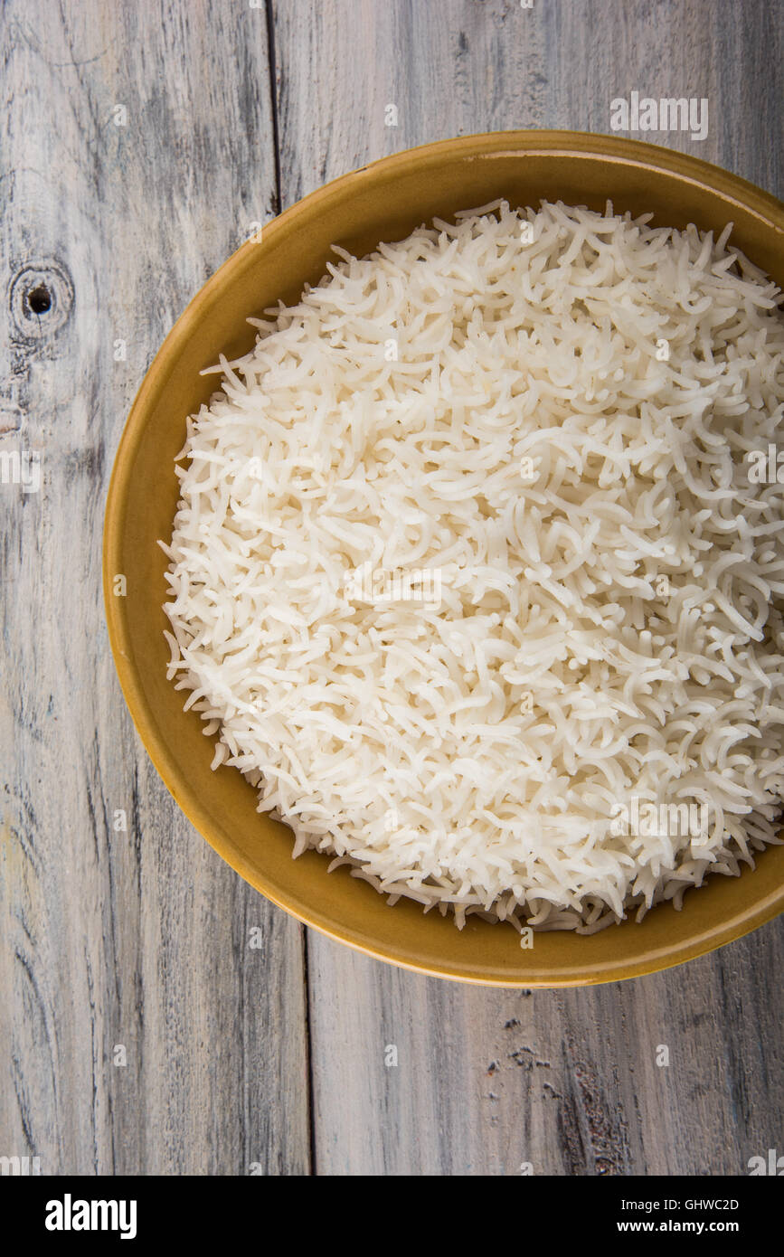 basmati rice in a brass bowl, cooked basmati rice, cooked plain rice ...