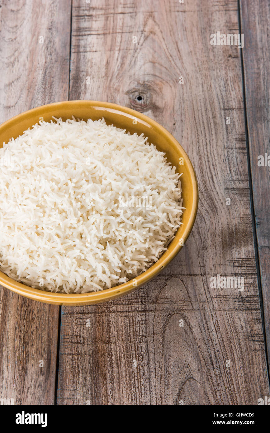 basmati rice in a brass bowl, cooked basmati rice, cooked plain rice ...