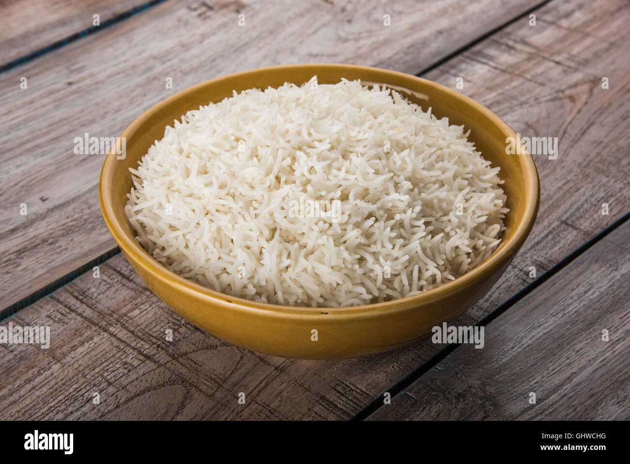 basmati rice in a brass bowl, cooked basmati rice, cooked plain rice ...