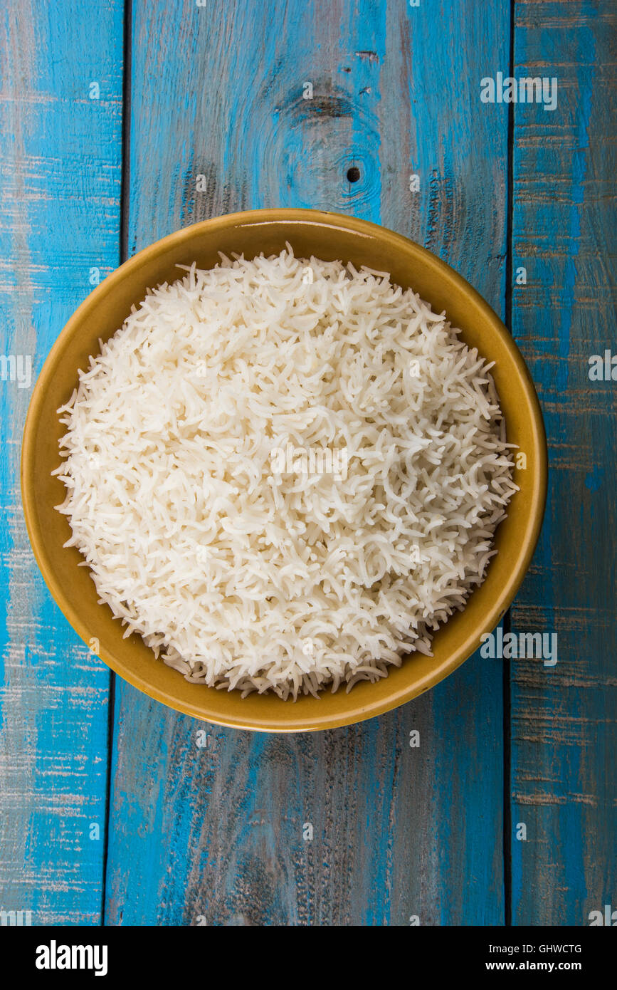 basmati rice in a brass bowl, cooked basmati rice, cooked plain rice ...
