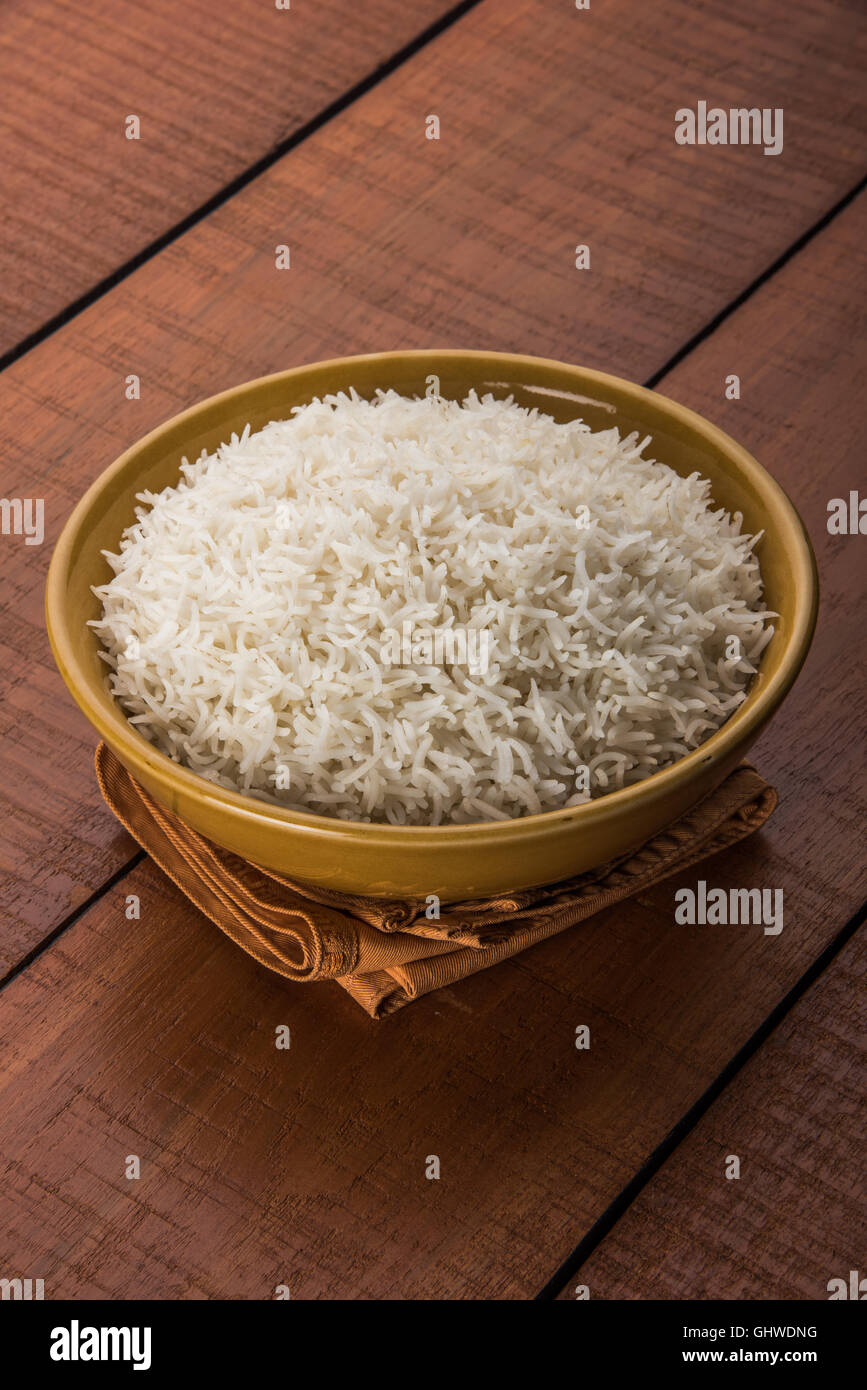 basmati rice in a brass bowl, cooked basmati rice, cooked plain rice ...