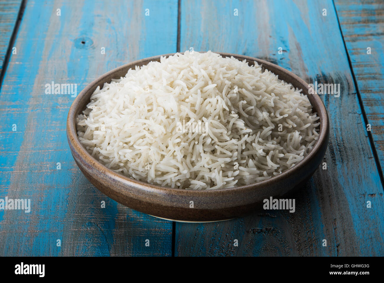 basmati rice in a brass bowl, cooked basmati rice, cooked plain rice ...