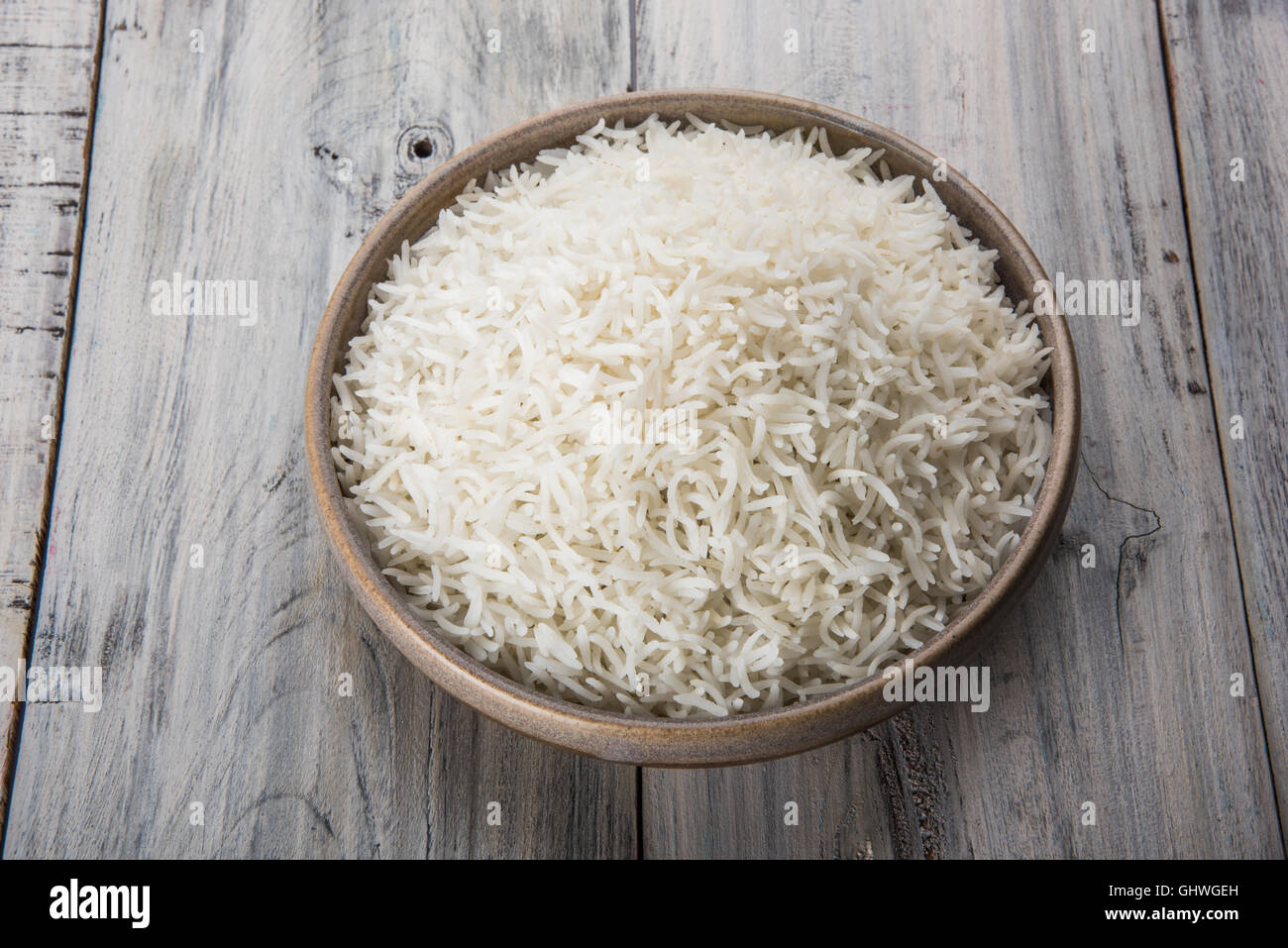 basmati rice in a brass bowl, cooked basmati rice, cooked plain rice ...