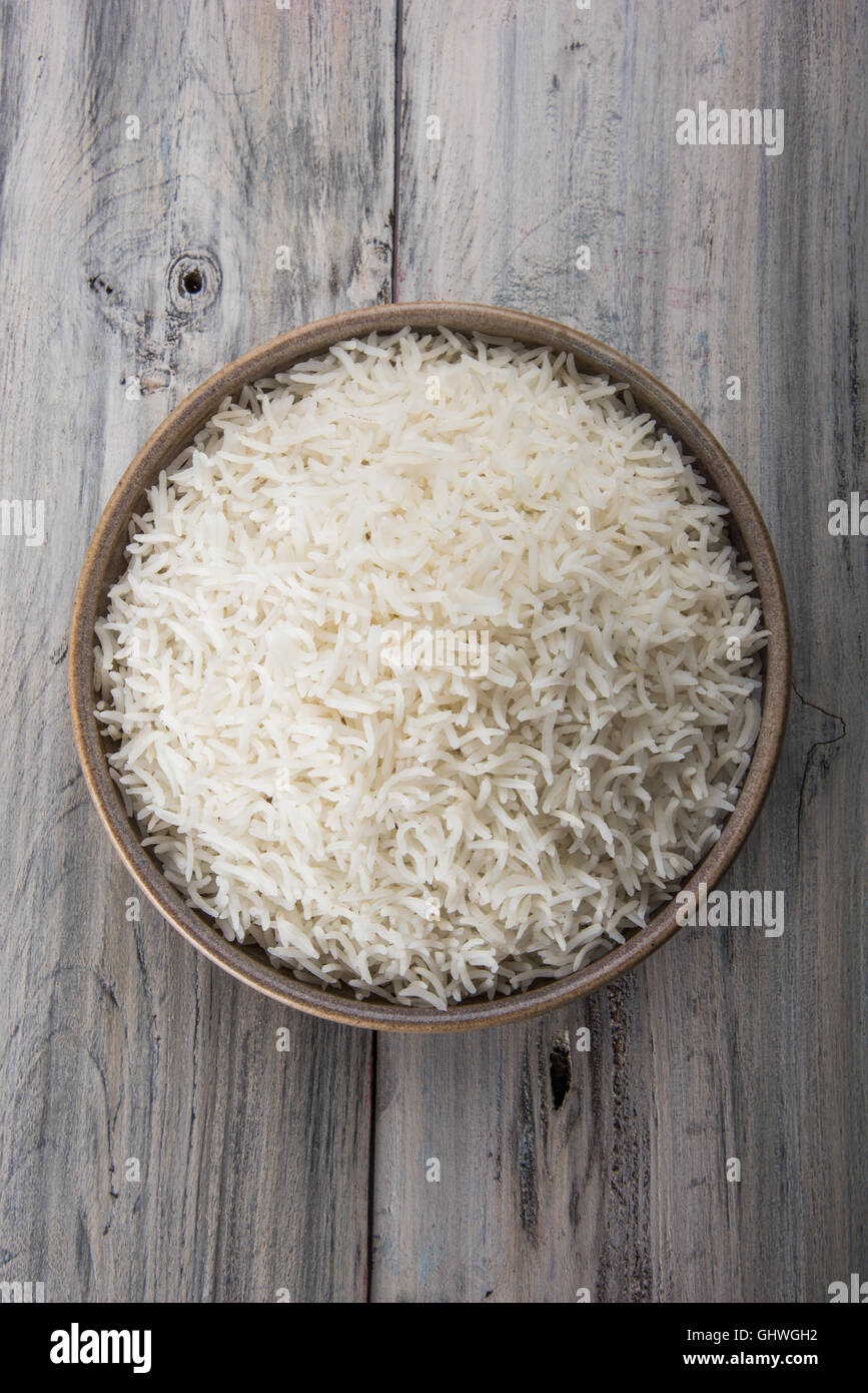 basmati rice in a brass bowl, cooked basmati rice, cooked plain rice ...