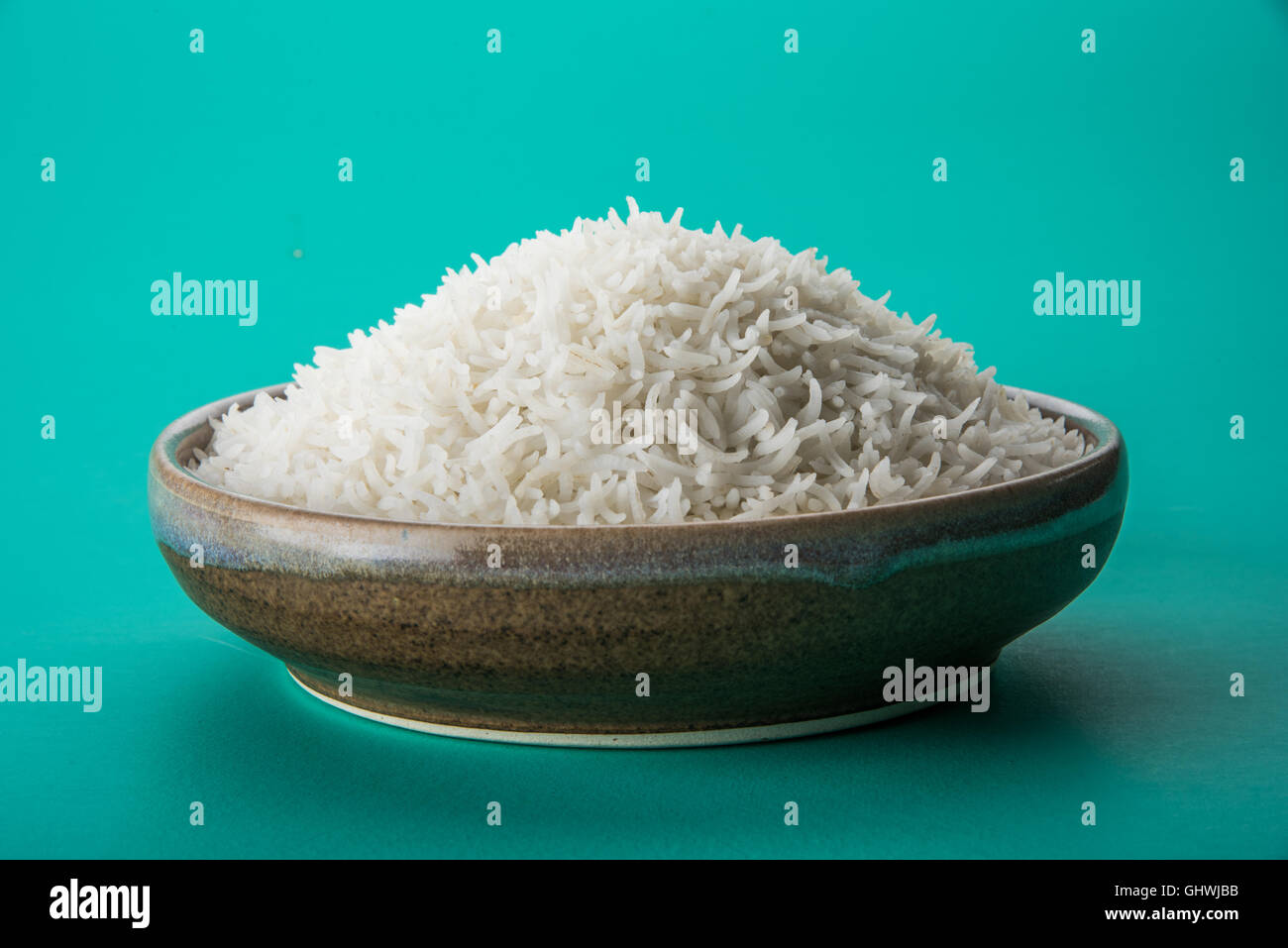 basmati rice in a brass bowl, cooked basmati rice, cooked plain rice ...