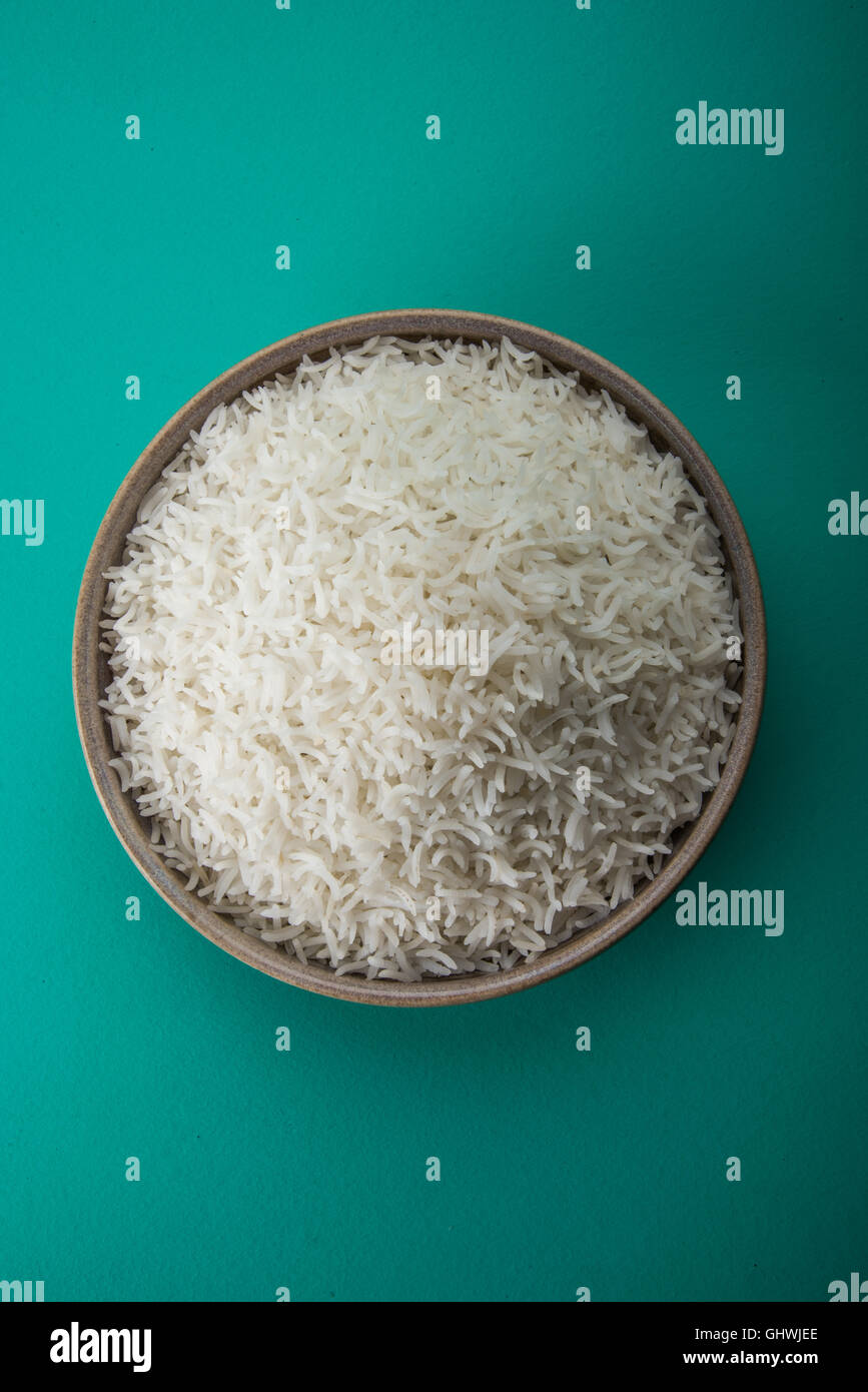 basmati rice in a brass bowl, cooked basmati rice, cooked plain rice ...
