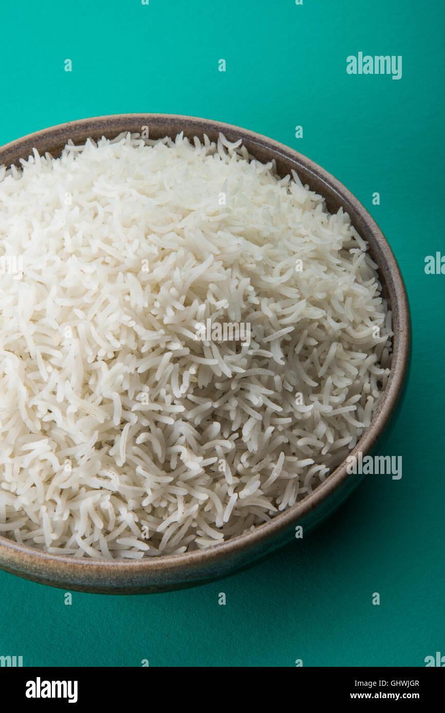 basmati rice in a brass bowl, cooked basmati rice, cooked plain rice ...