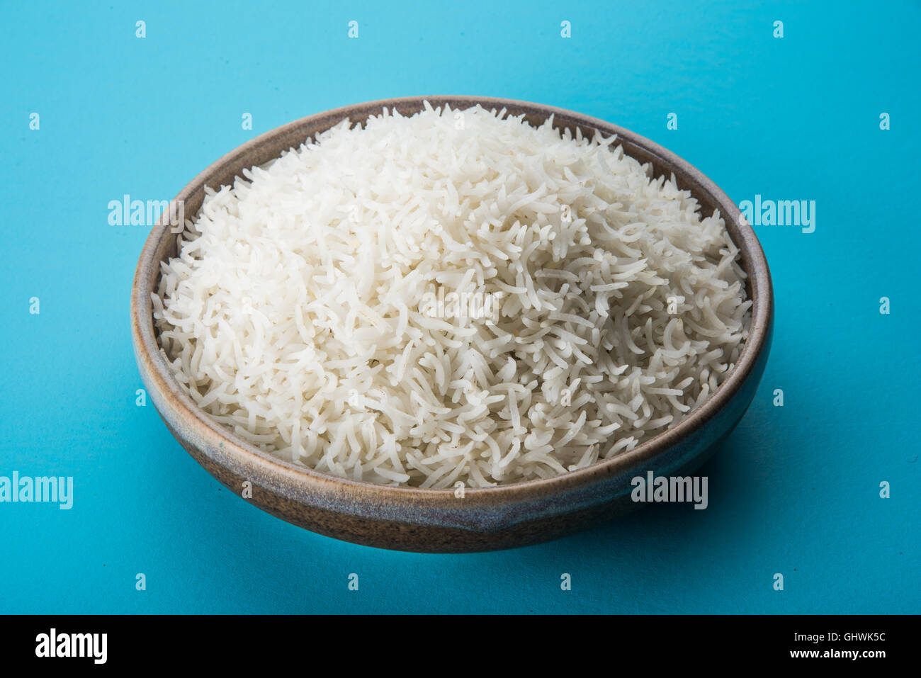 basmati rice in a brass bowl, cooked basmati rice, cooked plain rice ...