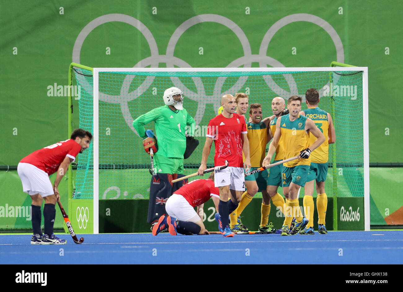 Great Britain's Nick Catlin (centre) looks dejected with teammates ...