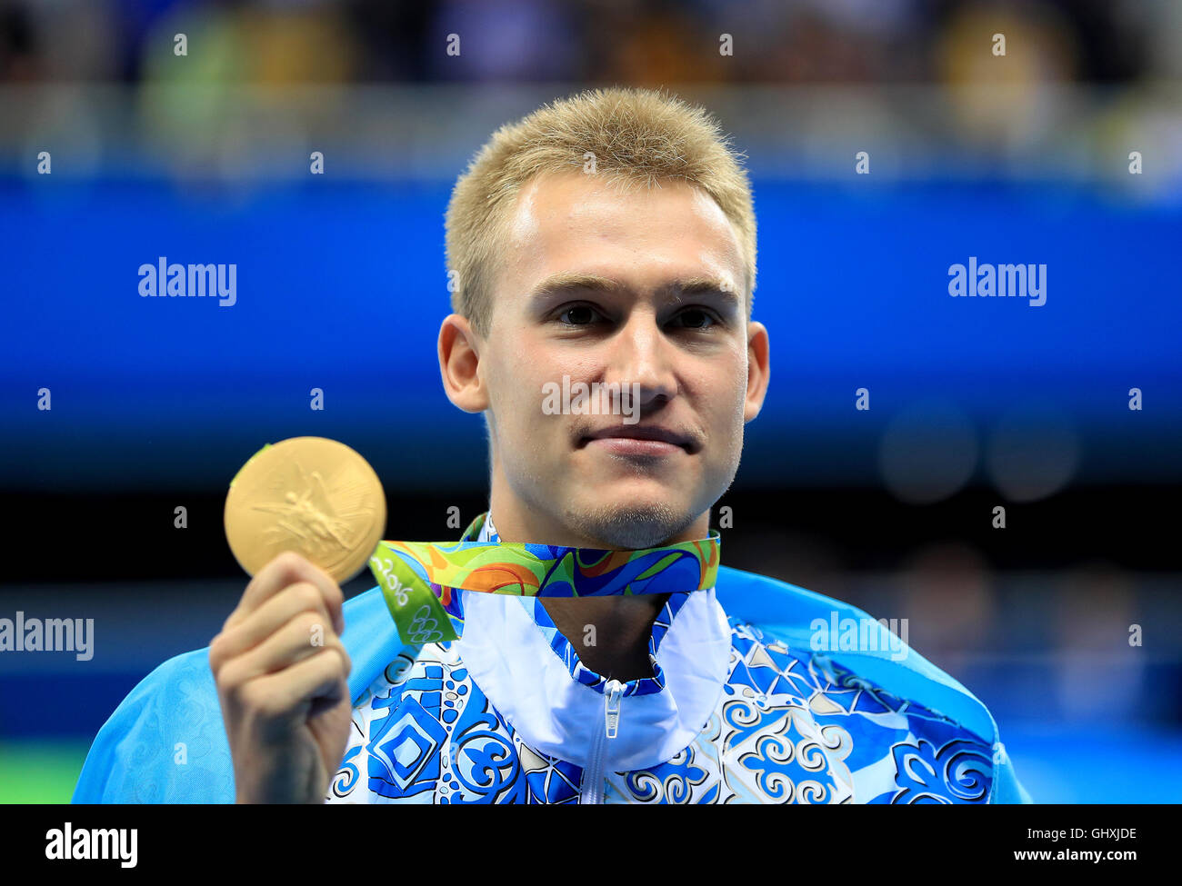 Kazakhstan's Dmitriy Balandin celebrates with his gold medal for the ...