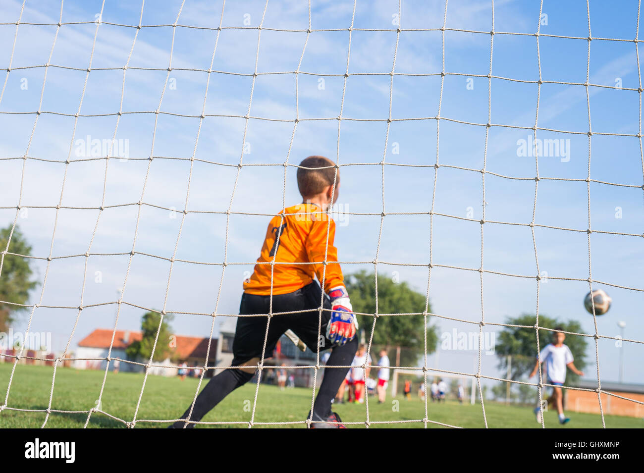 little soccer goalkeeper with gloves Stock Photo - Alamy