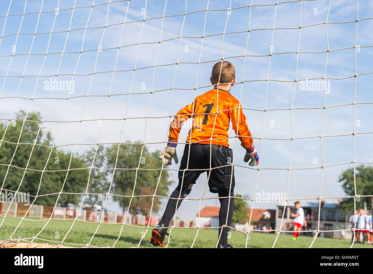 little soccer goalkeeper with gloves Stock Photo - Alamy