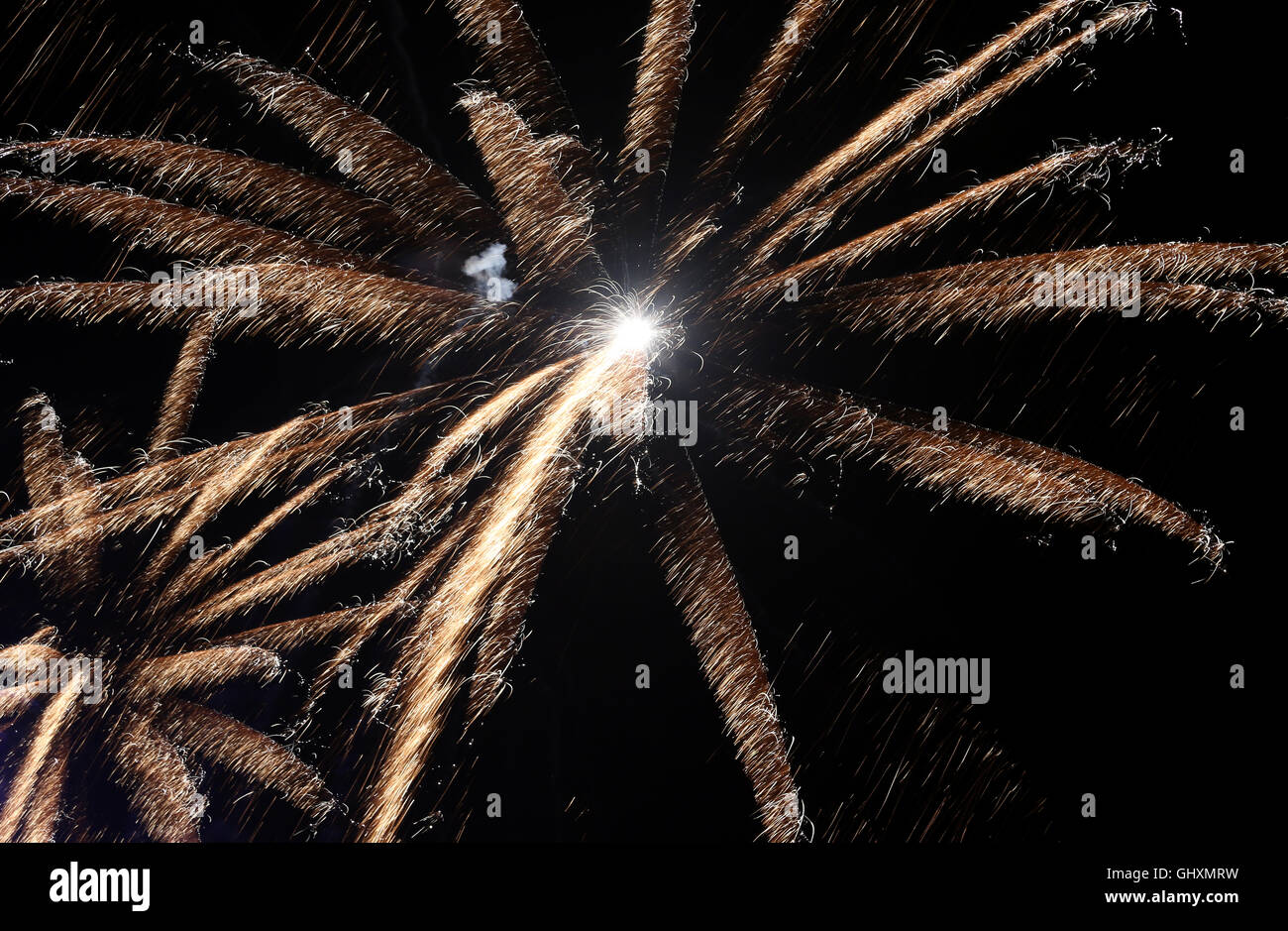 show with large colorful fireworks in the dark sky Stock Photo - Alamy