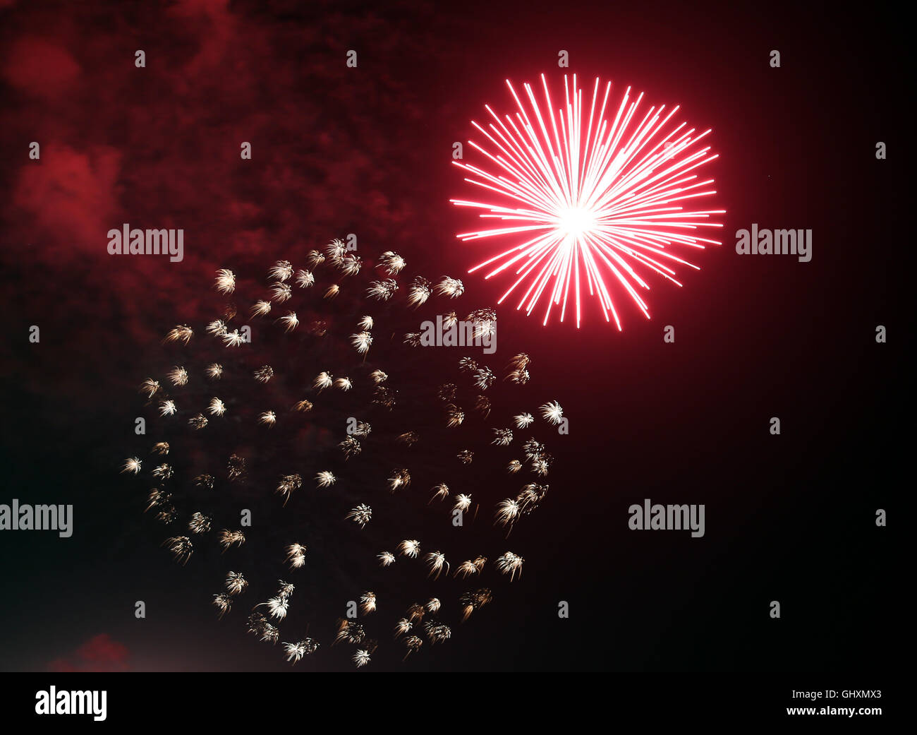 red large fireworks in the dark sky Stock Photo - Alamy