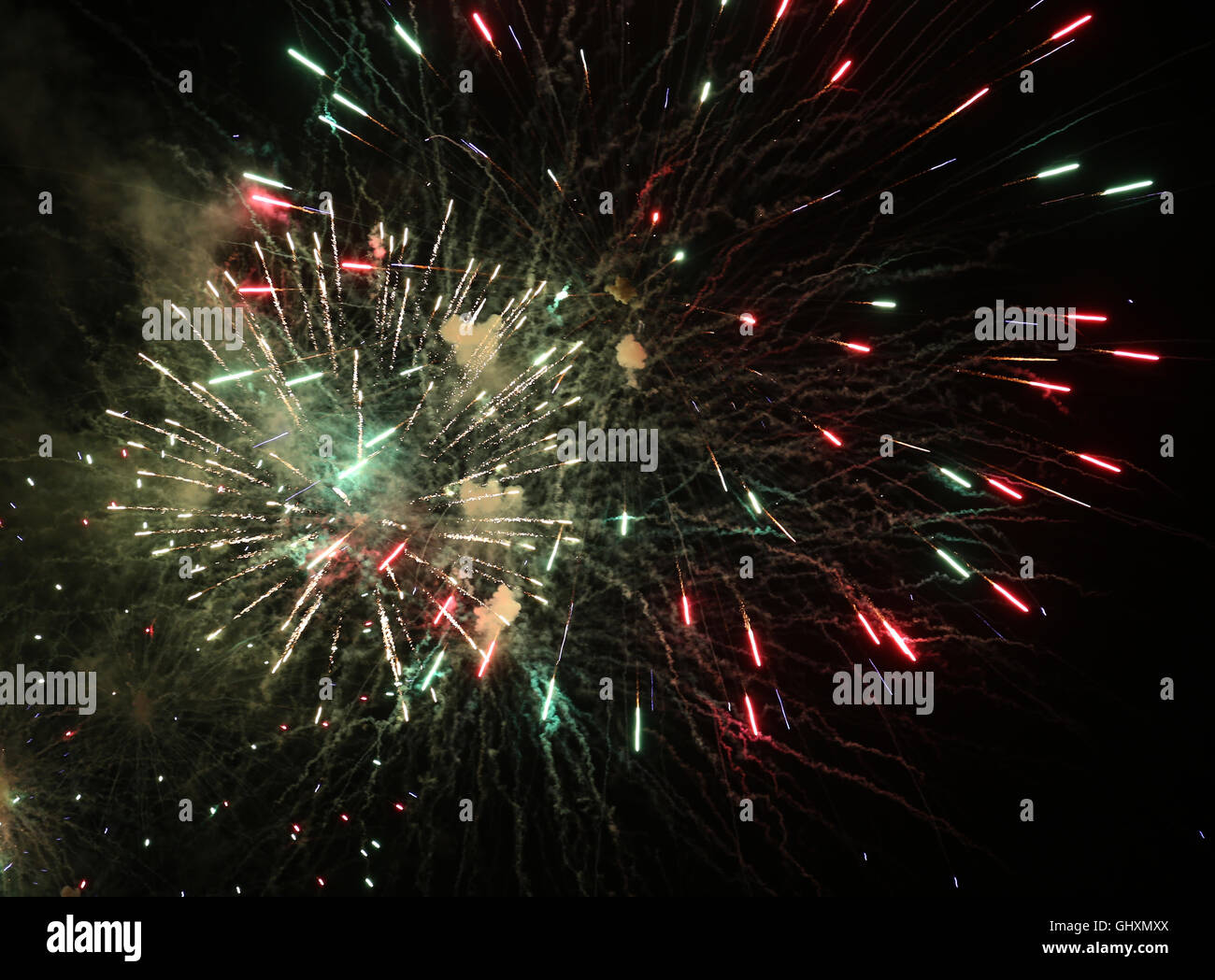 multicolor fireworks in the dark sky Stock Photo - Alamy