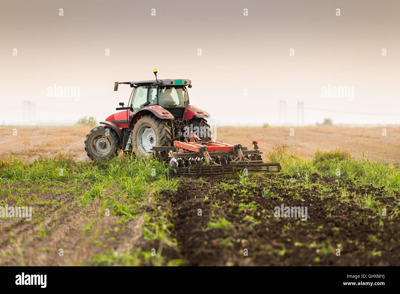 Plowing with a tractor hi-res stock photography and images - Alamy