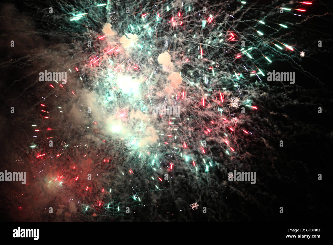 show with large colorful fireworks in the dark sky Stock Photo - Alamy