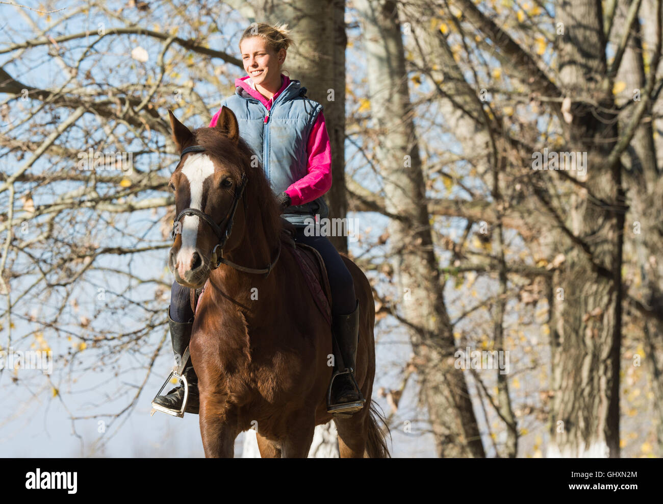 Girl horseback riding forest hi-res stock photography and images - Alamy