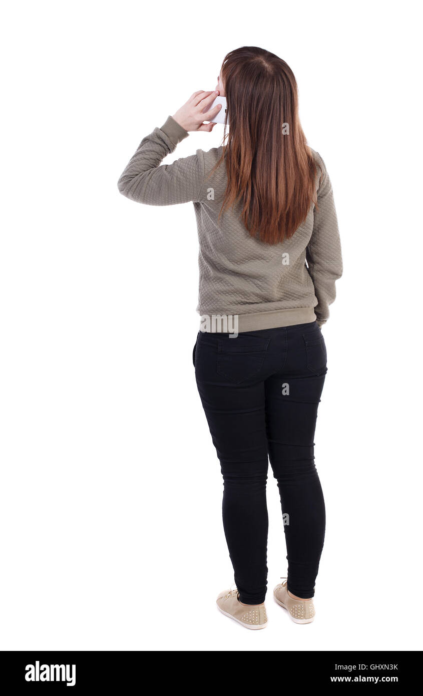 back view of a woman talking on the phone Stock Photo - Alamy