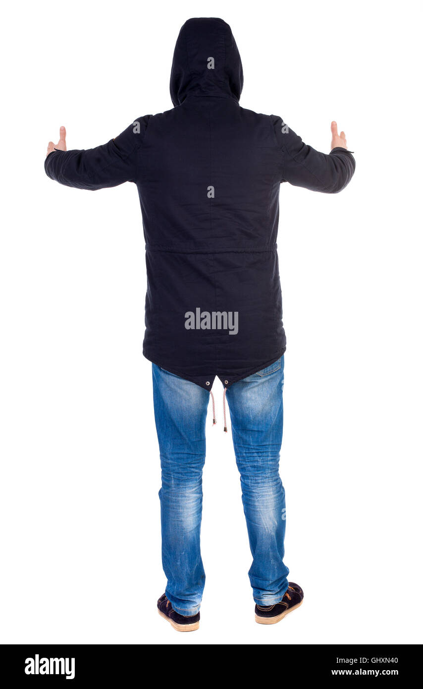 Back view of man. Raised his fist up in victory sign Stock Photo - Alamy