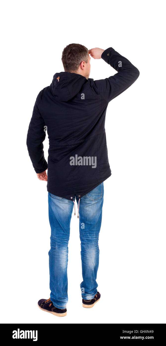 Back view of handsome man in winter jacket looking up Stock Photo - Alamy