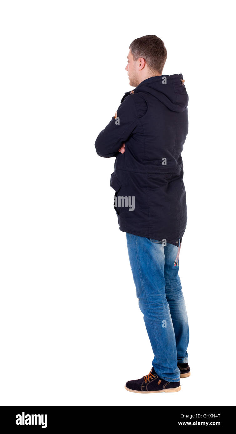 Back view of handsome man in winter jacket looking up Stock Photo - Alamy
