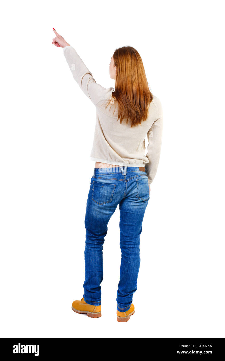 Back view of pointing woman. beautiful girl Stock Photo - Alamy
