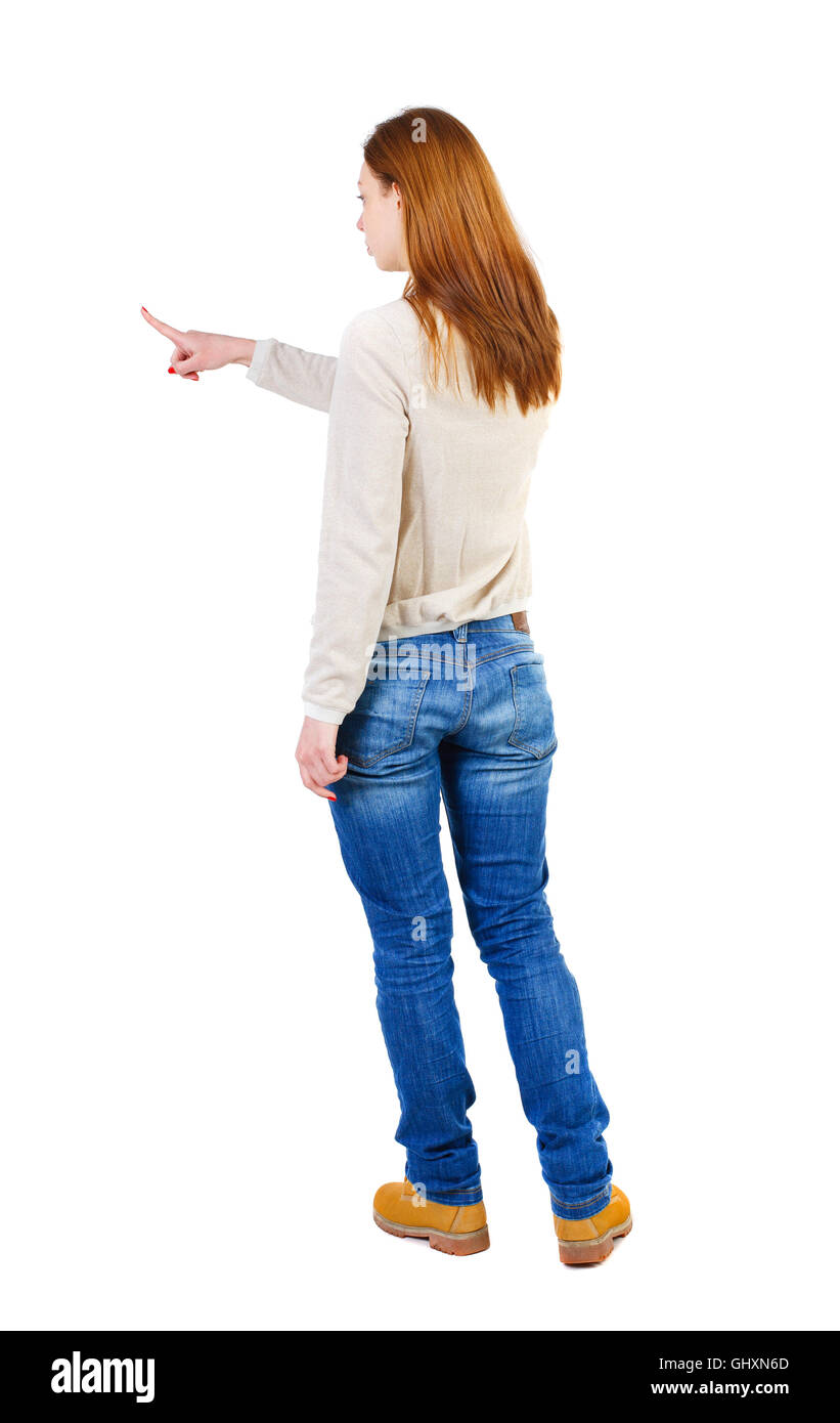 Back view of pointing woman. beautiful girl Stock Photo - Alamy