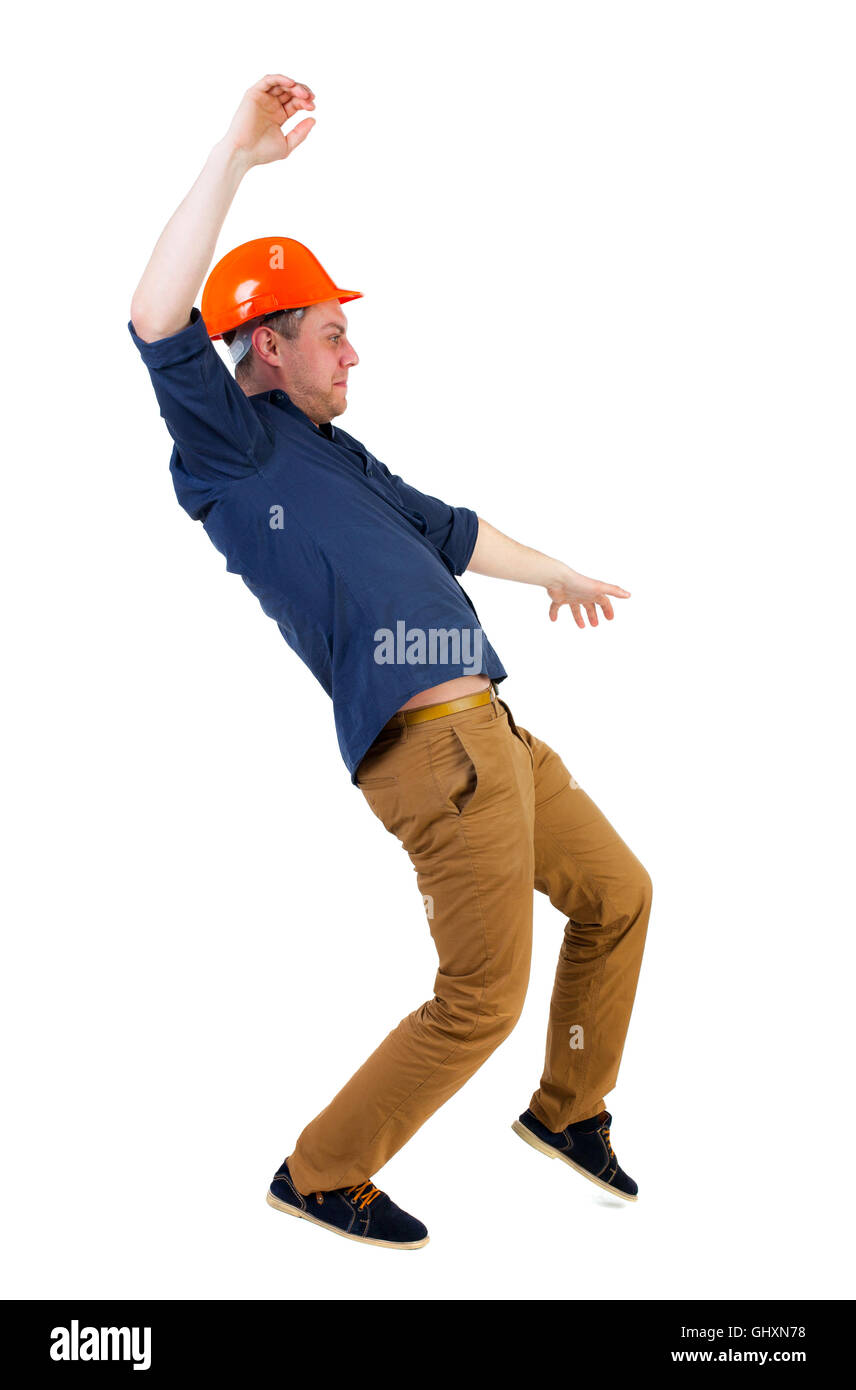 Balancing young man Stock Photo - Alamy