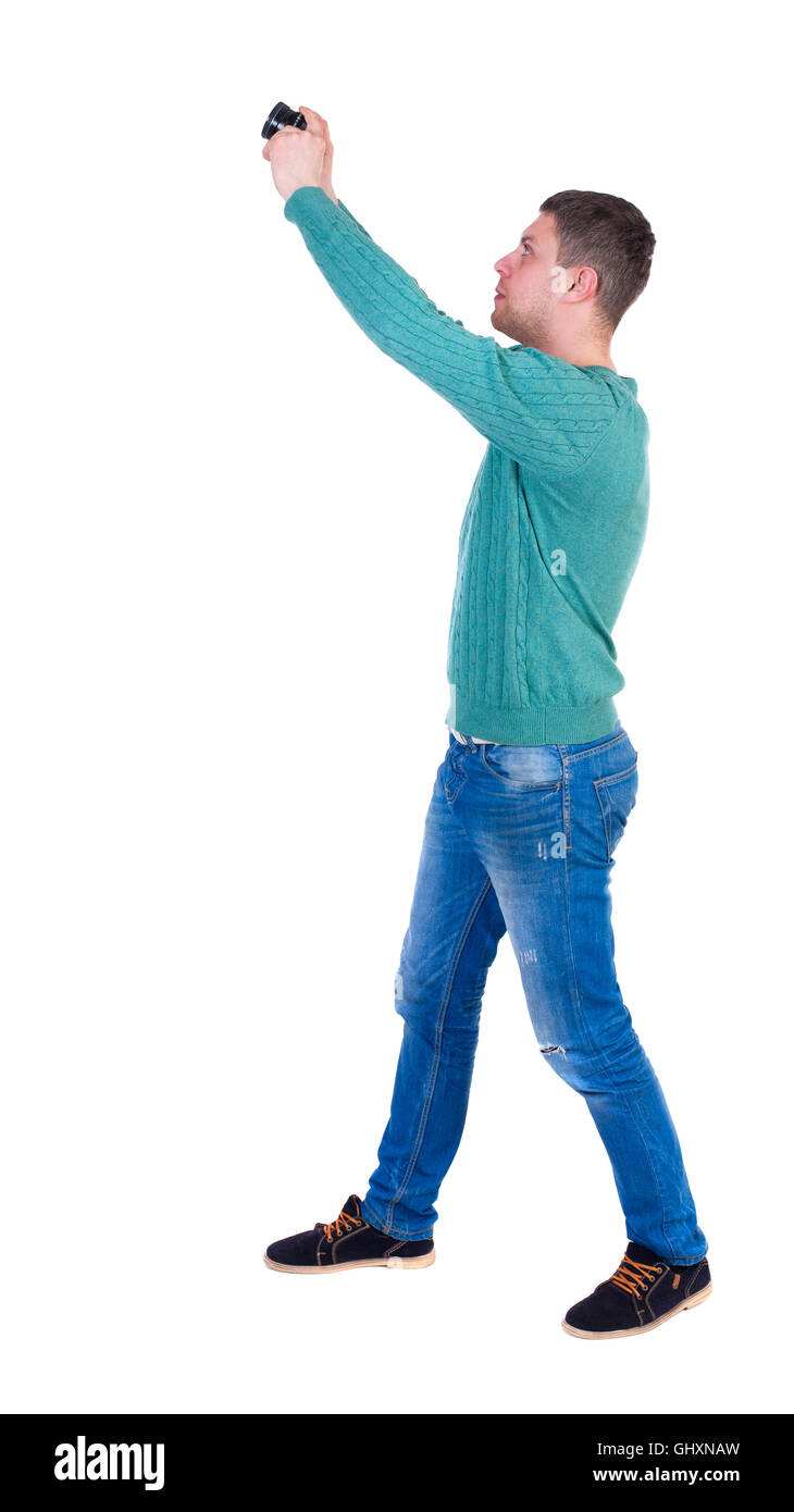 Back view of man photographing Stock Photo - Alamy