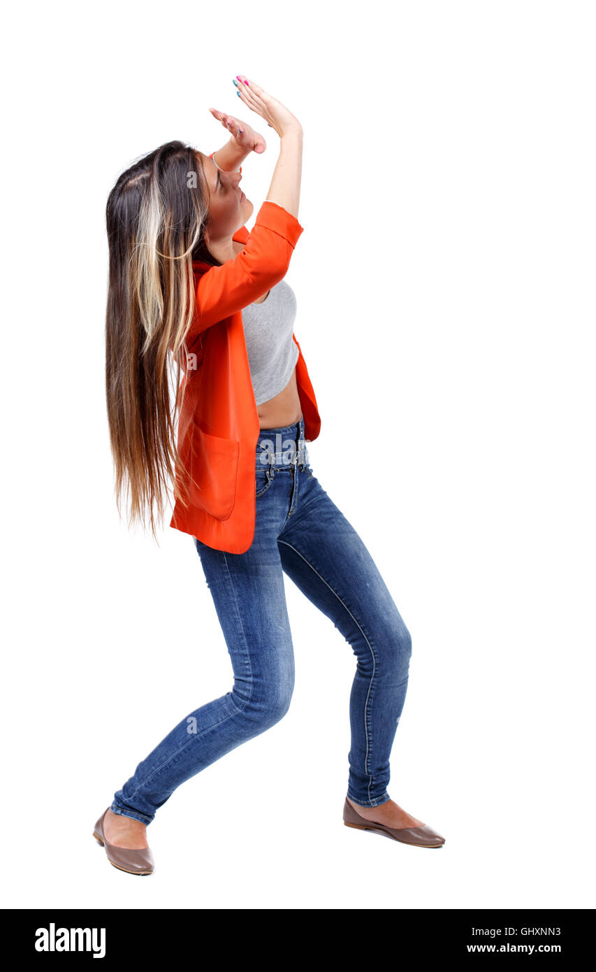 Balancing young woman Stock Photo - Alamy