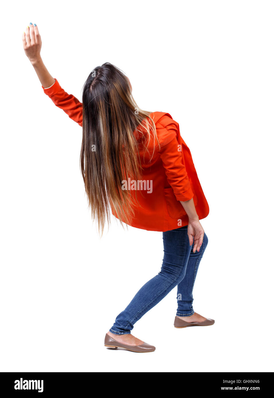Balancing young woman Stock Photo - Alamy