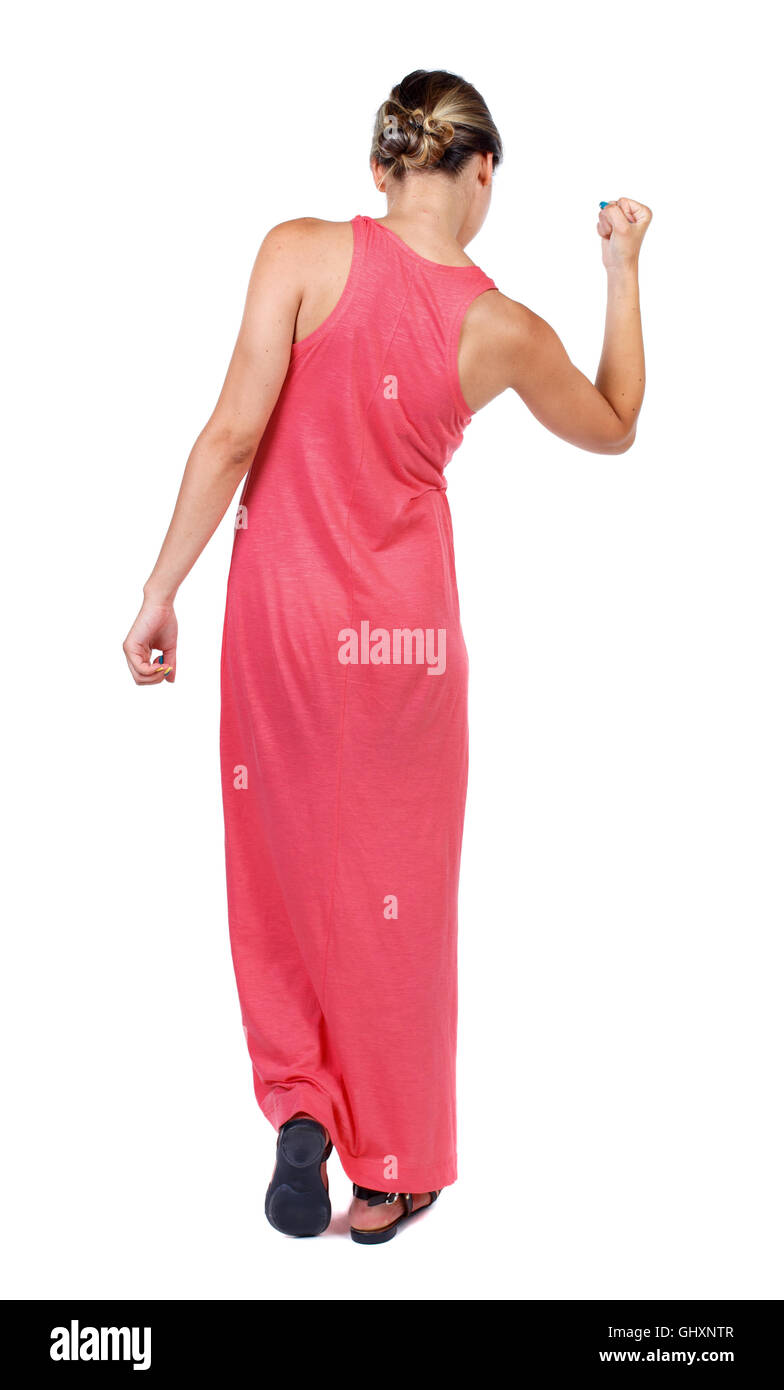 Back view of woman. Raised his fist up in victory sign Stock Photo - Alamy